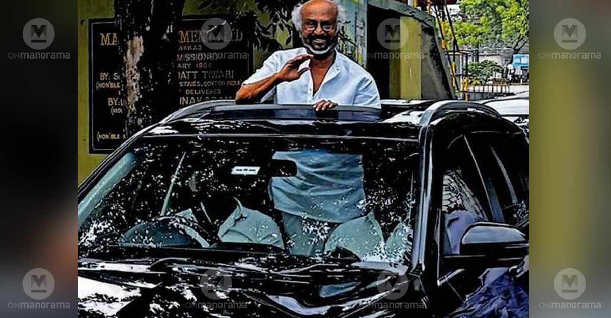 Rajinikanth waves at his fans in Valayar. Photo: Special arrangement ...