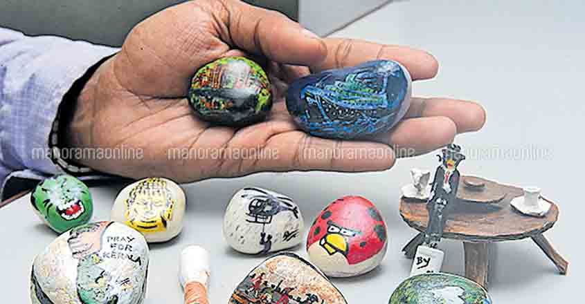 Moving images of flood rescue now come alive on pebbles | Kerala floods ...