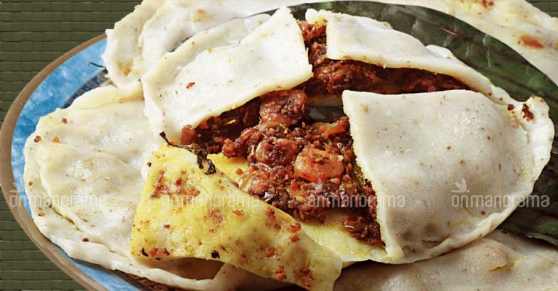 Traditional steamed pathiri with spiced prawn filling