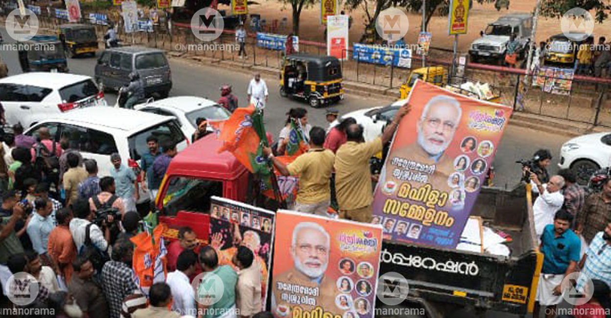 Thrissur Corp reinstalls Modi flex boards after BJP protest | Onmanorama
