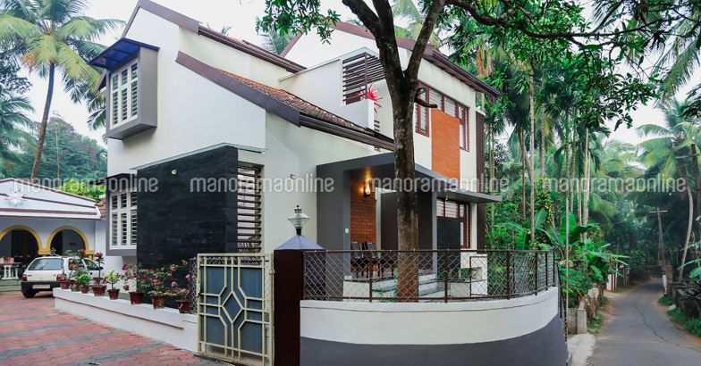 This three-storey house in Manjeri stands tall in three cents | Manjeri ...