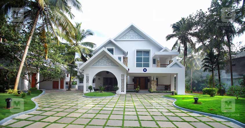 Mellifluous and artful, this colonial-themed house in Vatakara is music ...