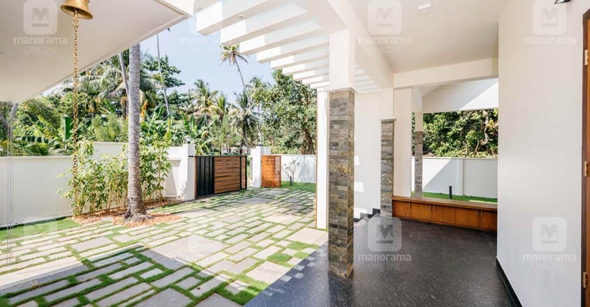 Surrounded by lush greenery, this Cherai house is cool and beautiful ...