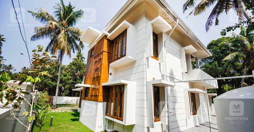 Surrounded by lush greenery, this Cherai house is cool and beautiful ...