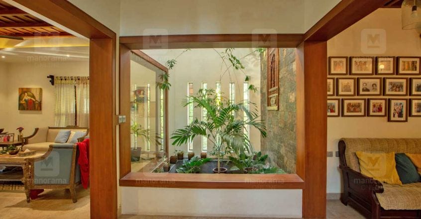 Tradition joins hands with modernity in this grand Kumbanad mansion ...