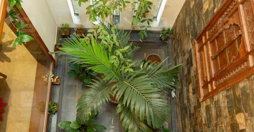 Tradition joins hands with modernity in this grand Kumbanad mansion ...