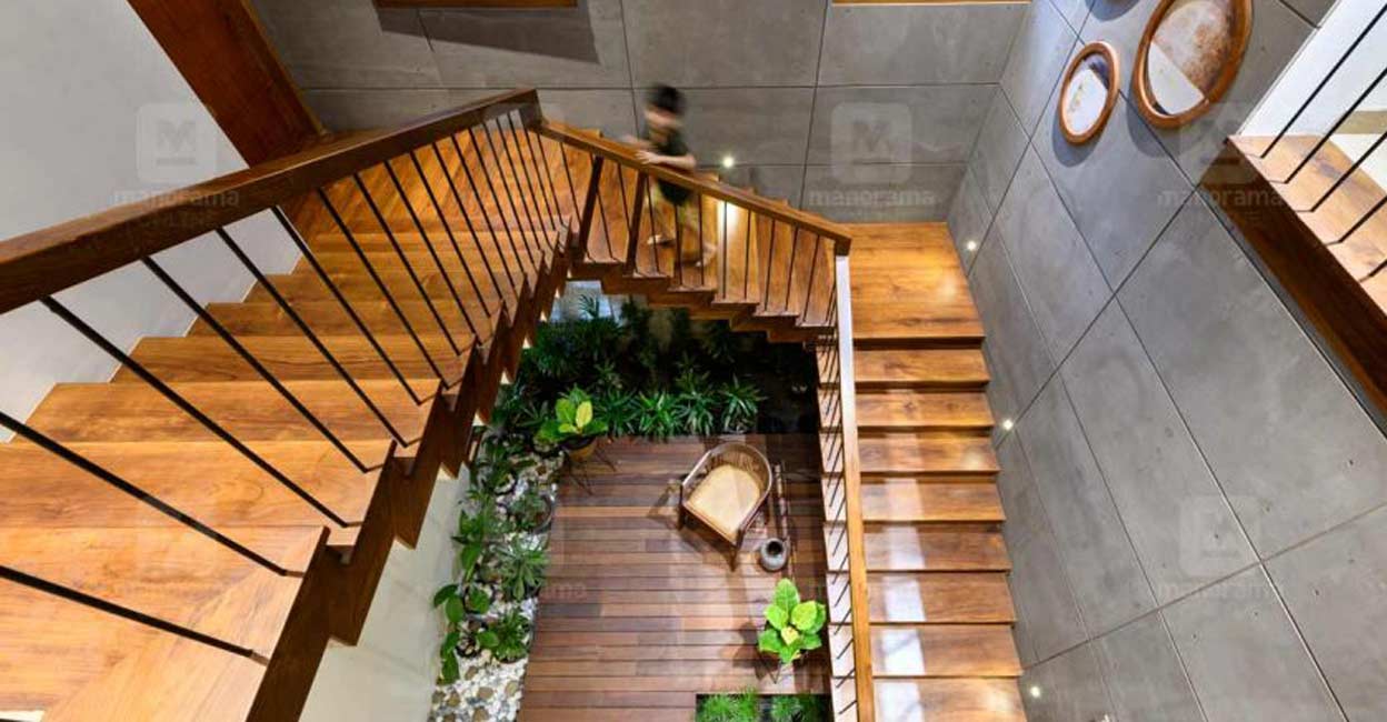 This Perinthalmanna house is designed to suit unpredictable weather of ...