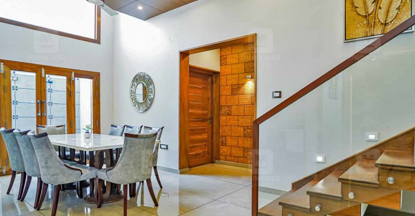 Contemporary design leaves this Thalassery house in 7 cents stunning ...