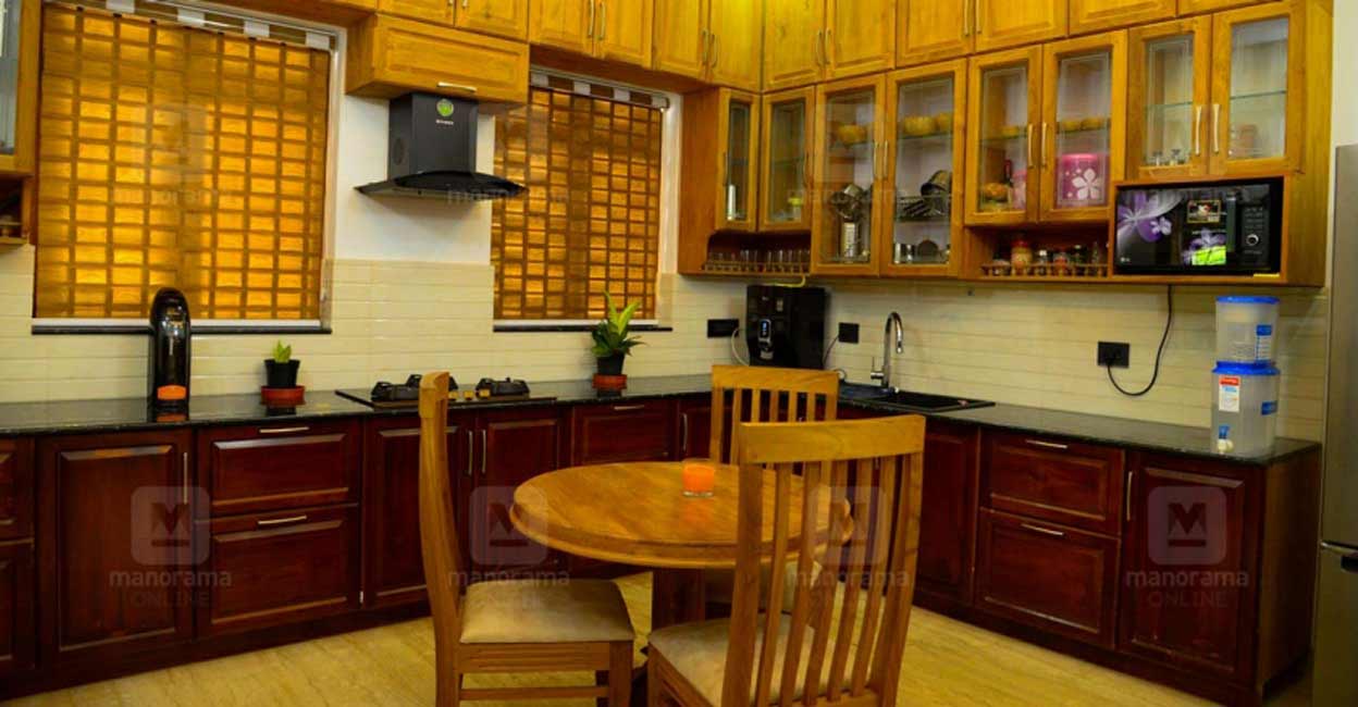 Surrounded by natural greenery, this single-storey Marangattupilly ...