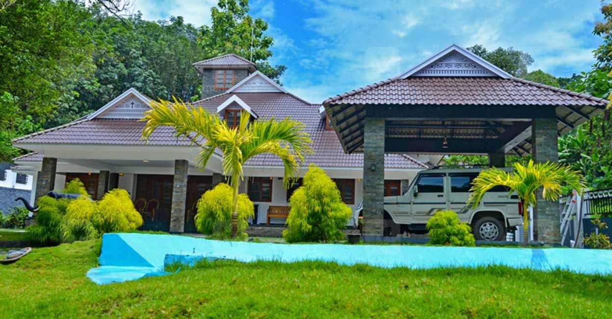 Surrounded by natural greenery, this single-storey Marangattupilly ...