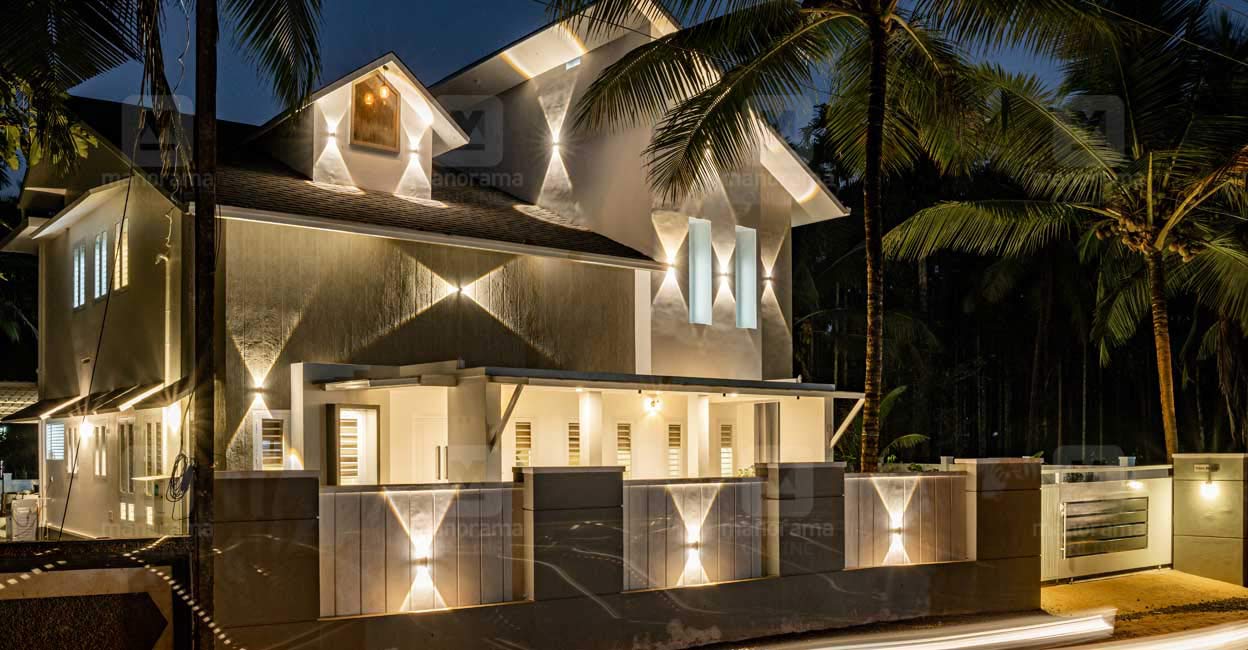 This dual faced Manjeri house is contemporary, chic and comfortable