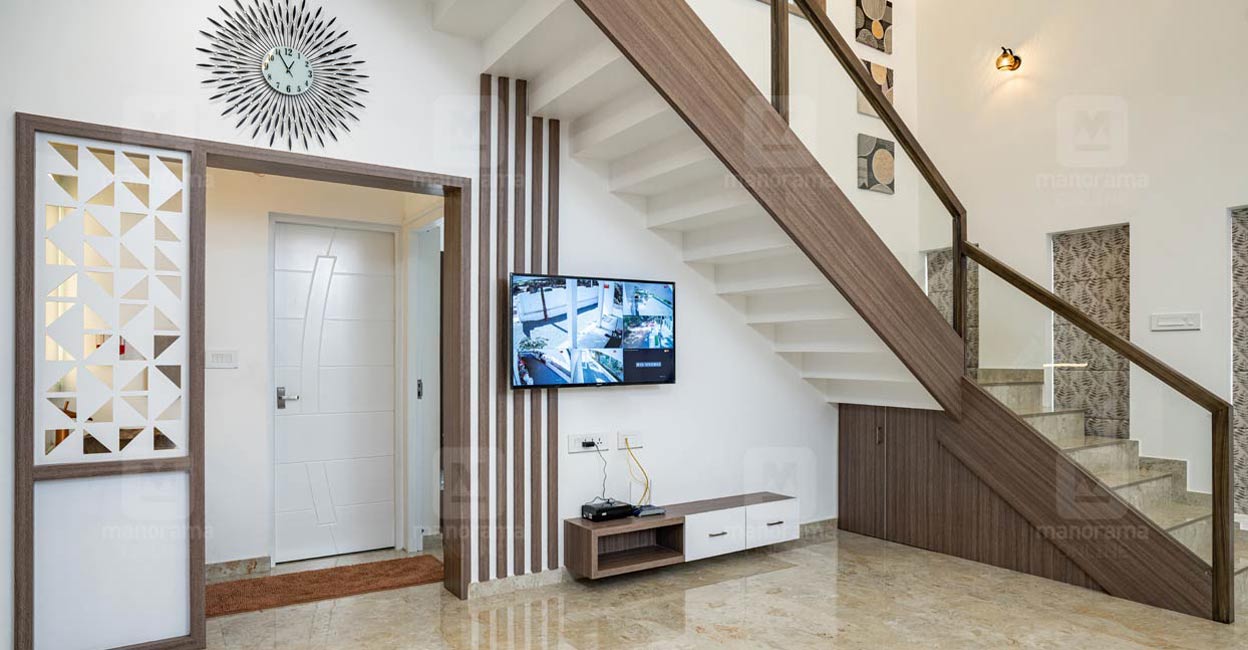 This dual faced Manjeri house is contemporary, chic and comfortable