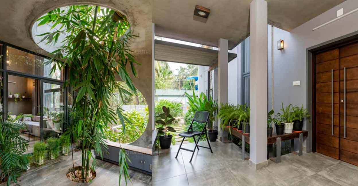 Rustic themed house in Tirur impresses with unique designer features ...