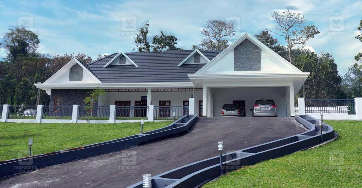 This colonial mansion in Kanjirappally dons multiple looks from ...