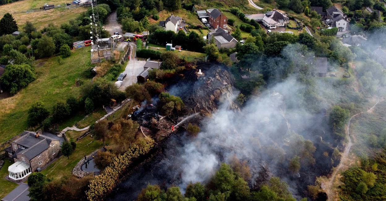 Britain swelters on its hottest day as heat wave sweeps across Europe ...
