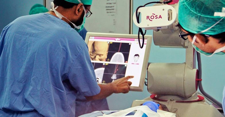 Auto driver beats Parkinson's after first robotic assisted DBS surgery ...