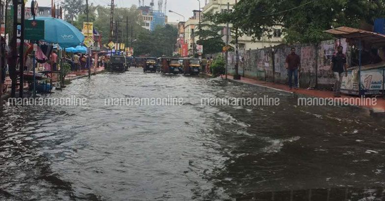 First showers of monsoon sink Kochi streets | Pix