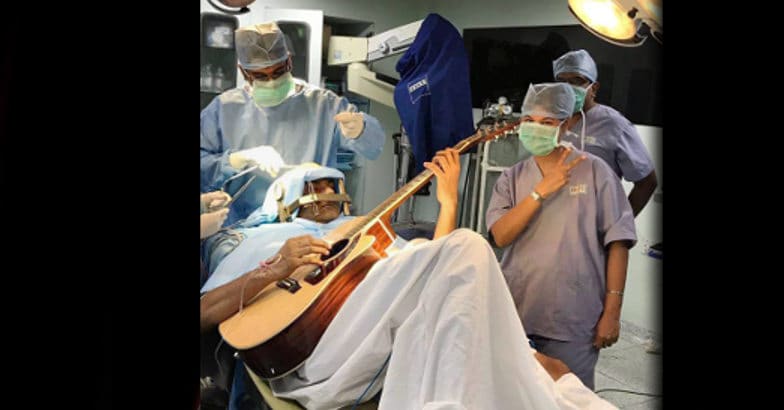 Do you know why this patient strummed guitar during a brain surgery