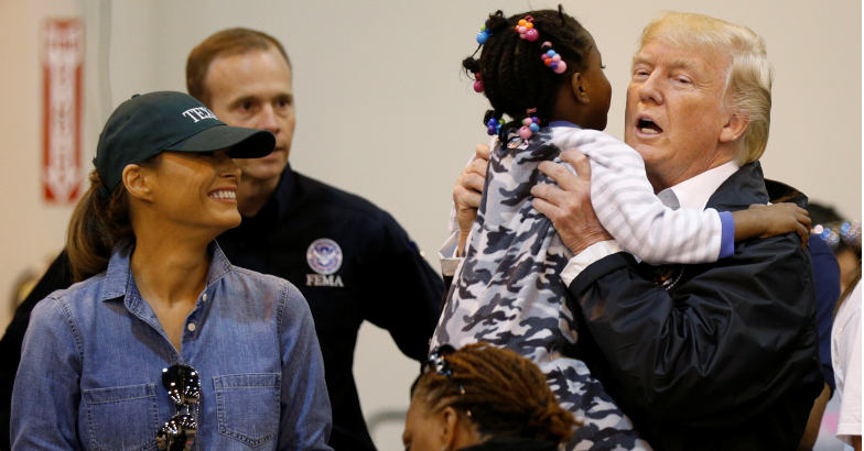 Trump hugs children, serves food to victims of Harvey | Trump hugs ...