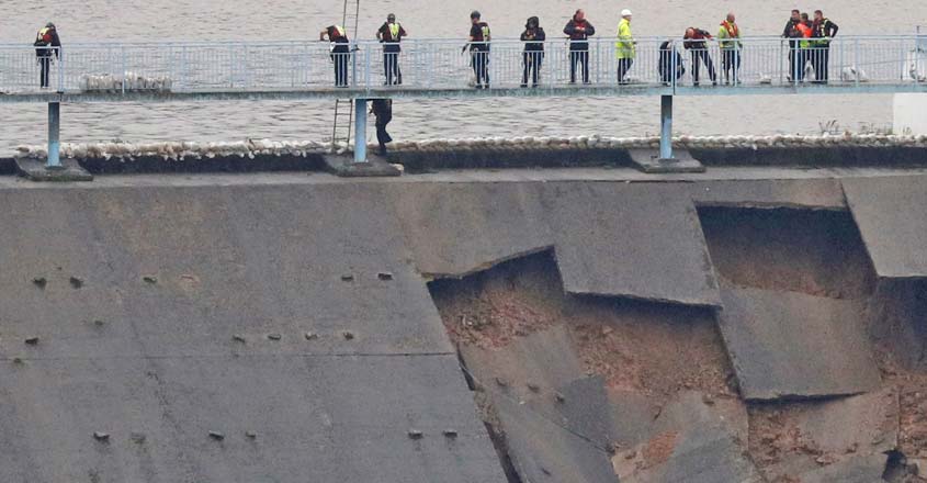 British military called in to stop dam collapsing and flooding town