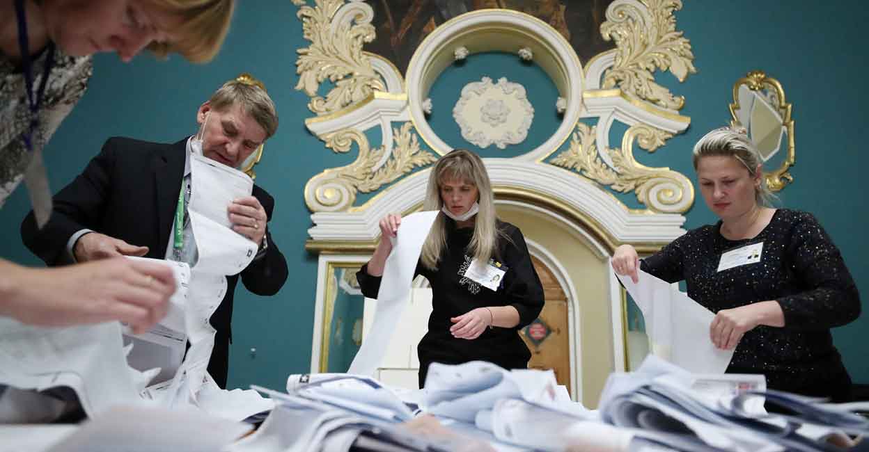 Russian pro-Putin party wins big majority after crackdown; foes cry foul