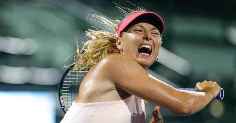 Sharapova moves up with a hard-fought win on return